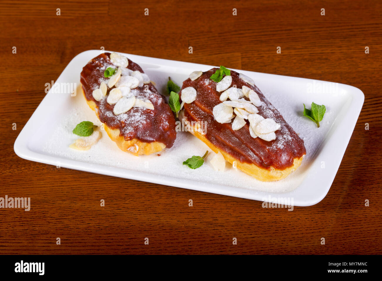 Sweet tasty choco Eclair Stock Photo - Alamy