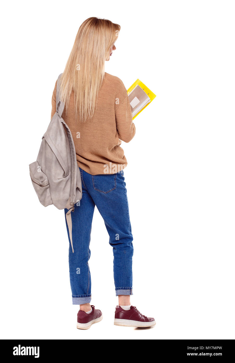 Back view of woman with notebooks and backpack. backside view of person ...