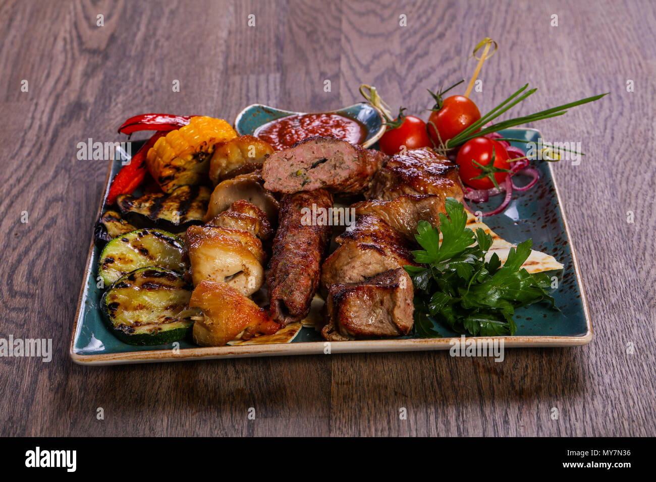 Grilled plate mix assortment meat Stock Photo - Alamy