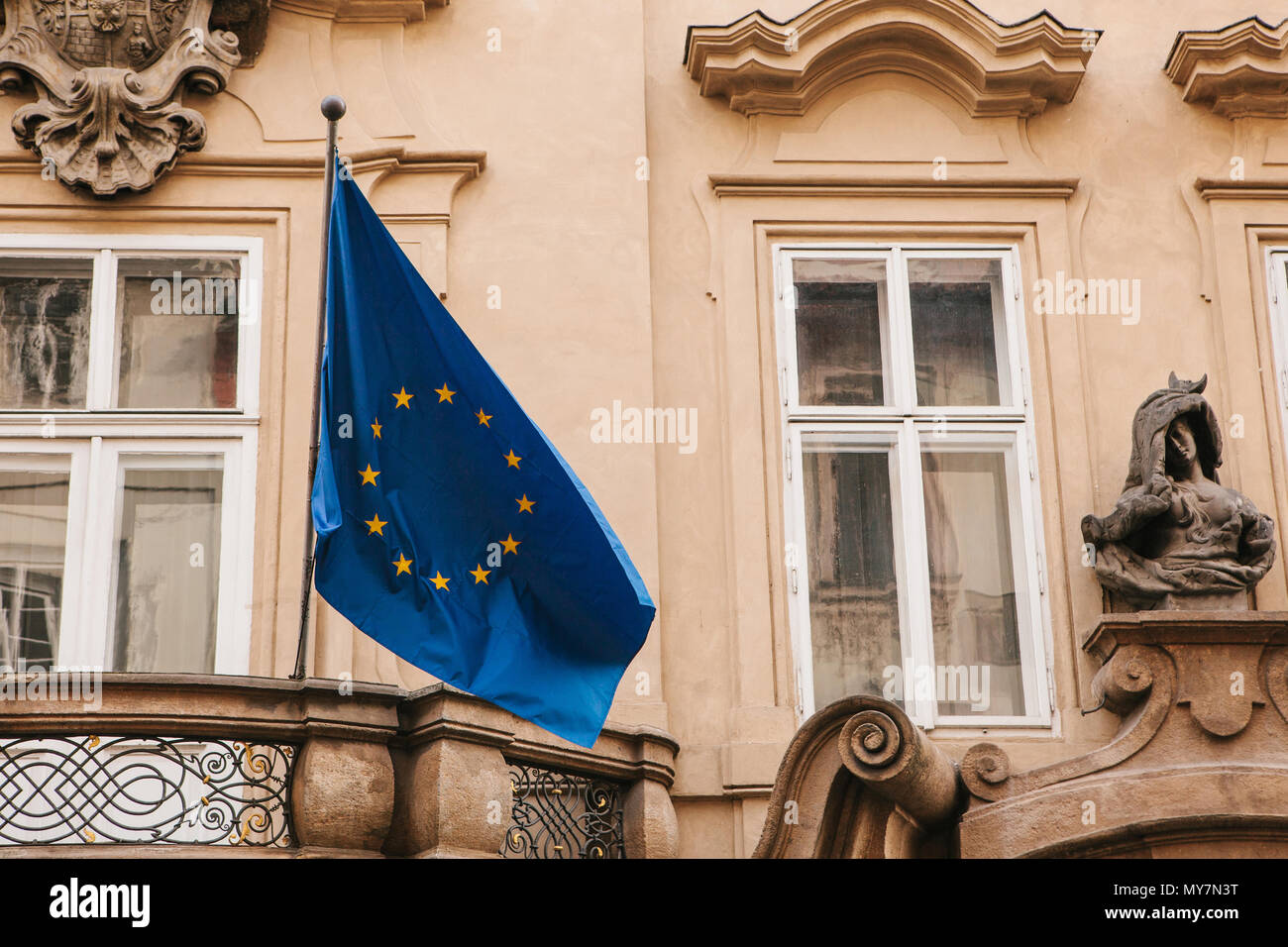 The flag of the European Union on a city building in Prague in the ...