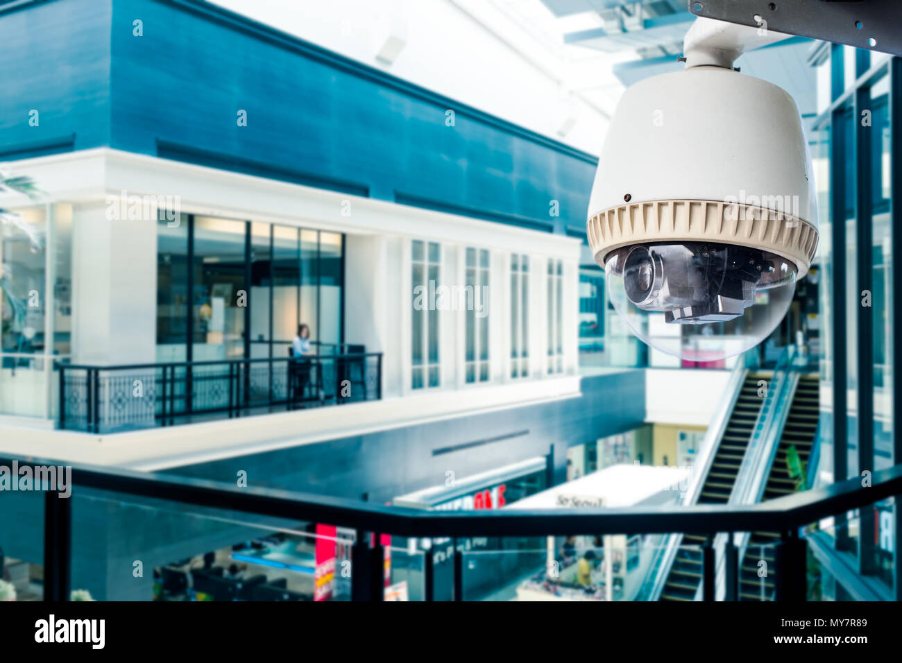 CCTV Camera of Surveillance operating in blue biulding Stock Photo - Alamy
