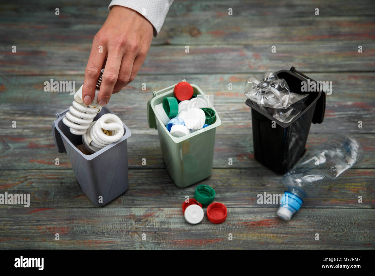 Ecology concept, a lot of recyclable objects in containers on the ...