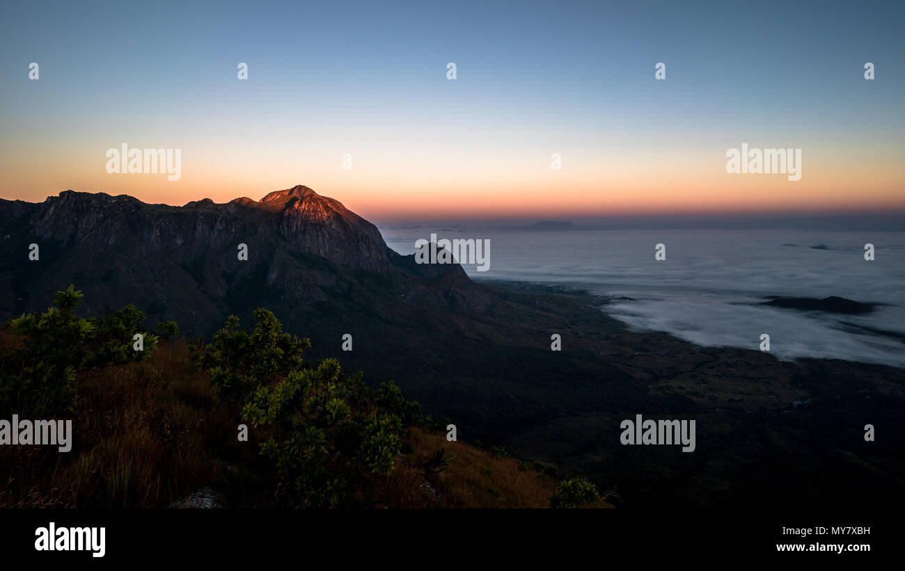 Chambe glowing in the first light of the day with a sea of clouds in ...