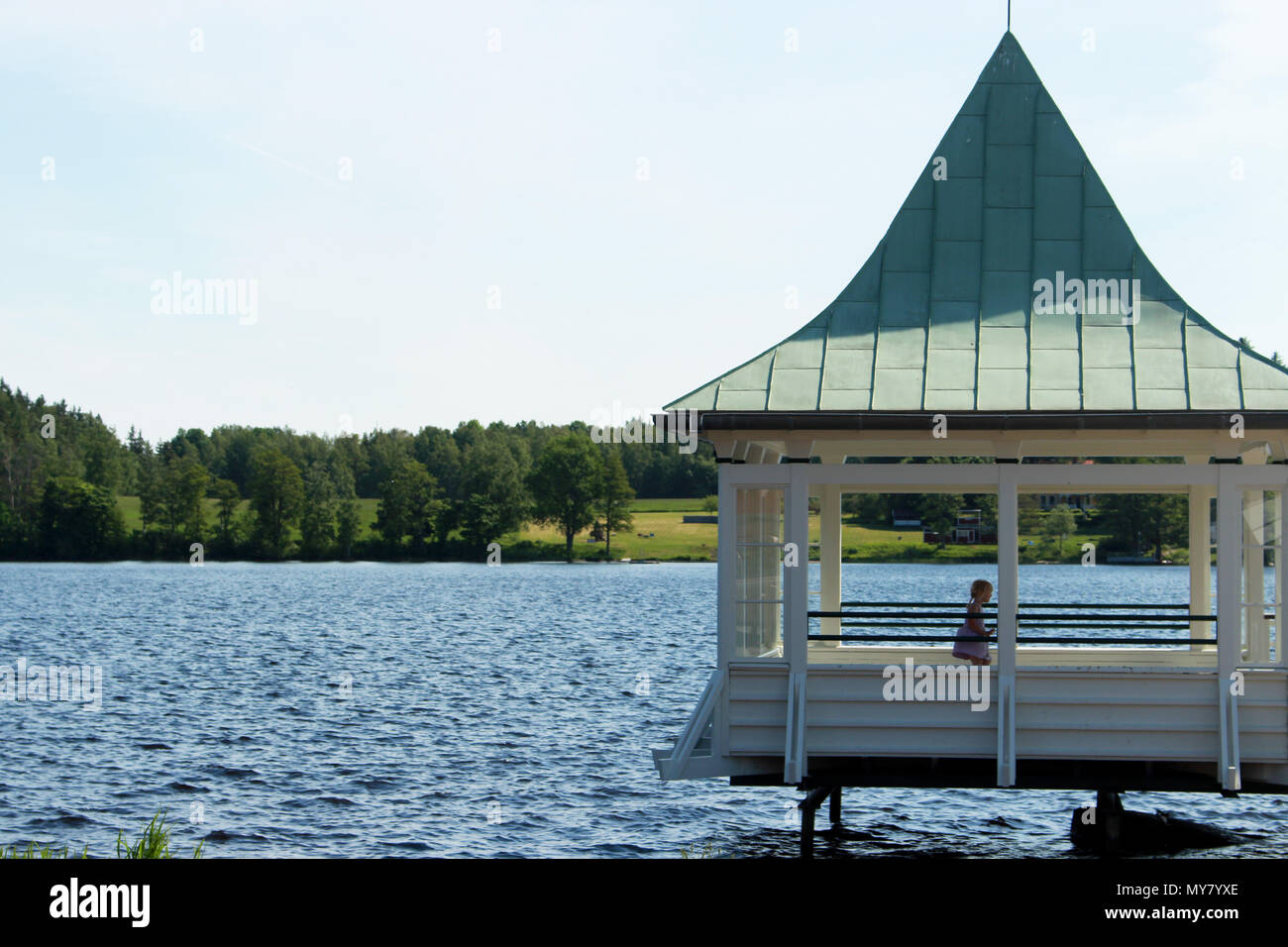 A child playing inside one of the viewpoints of the Nora lake Stock ...