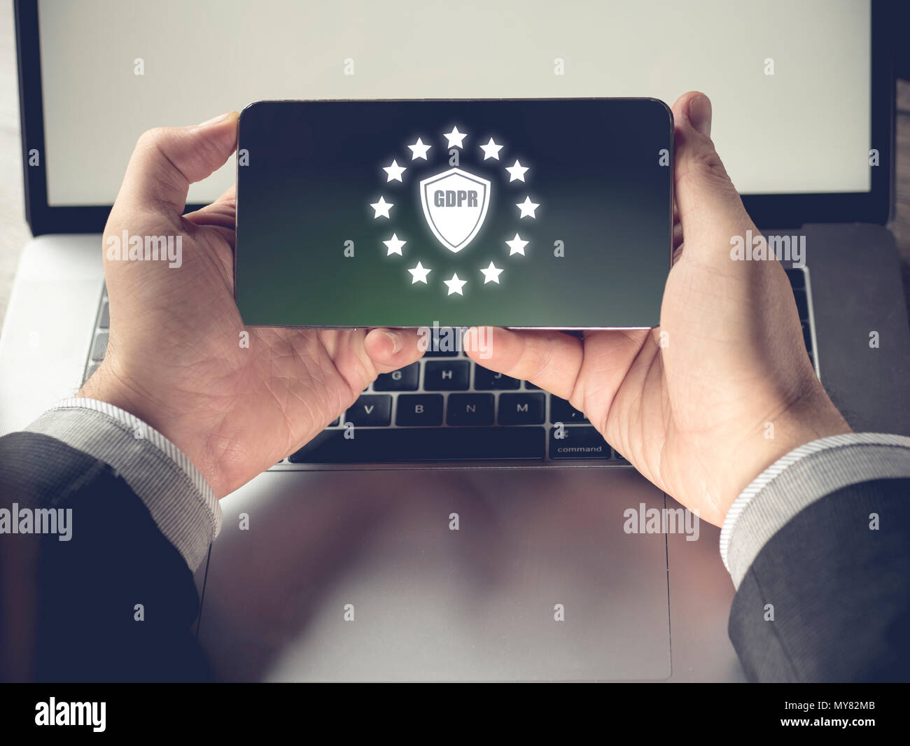 Businessman using smartphone screen device show sign general data ...