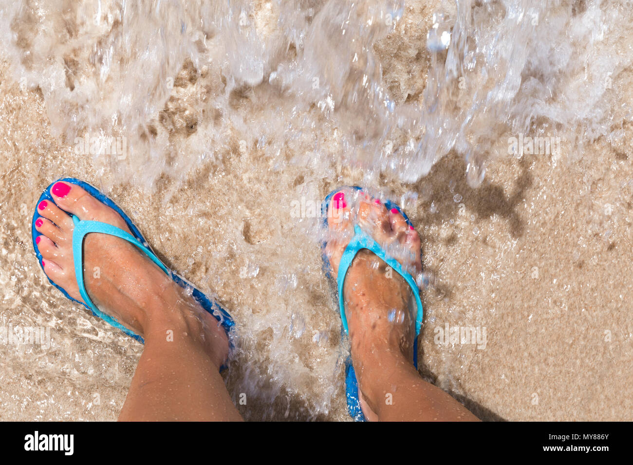 Legs woman on beach hi-res stock photography and images - Alamy