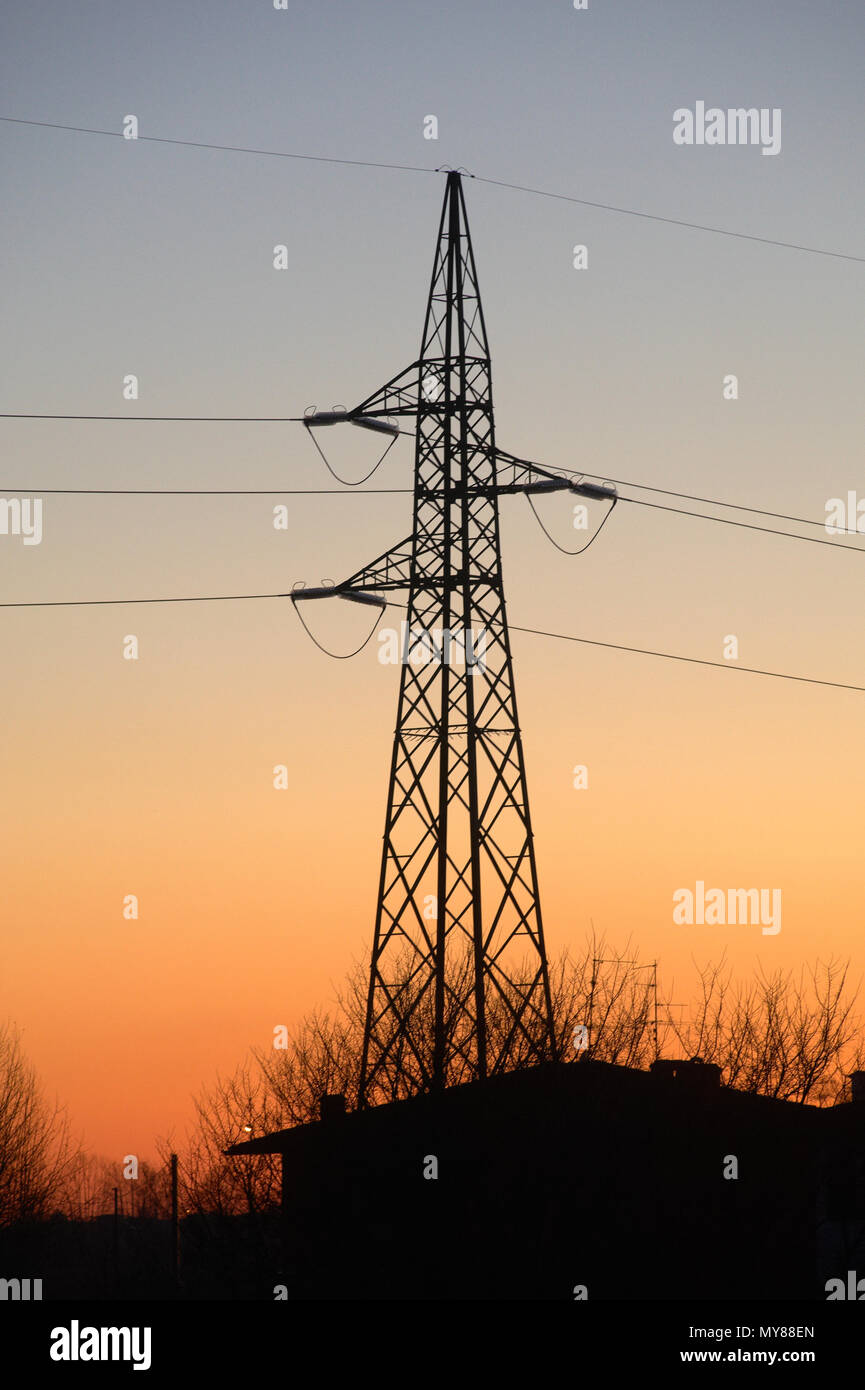 electrical pylon at sunset Stock Photo - Alamy