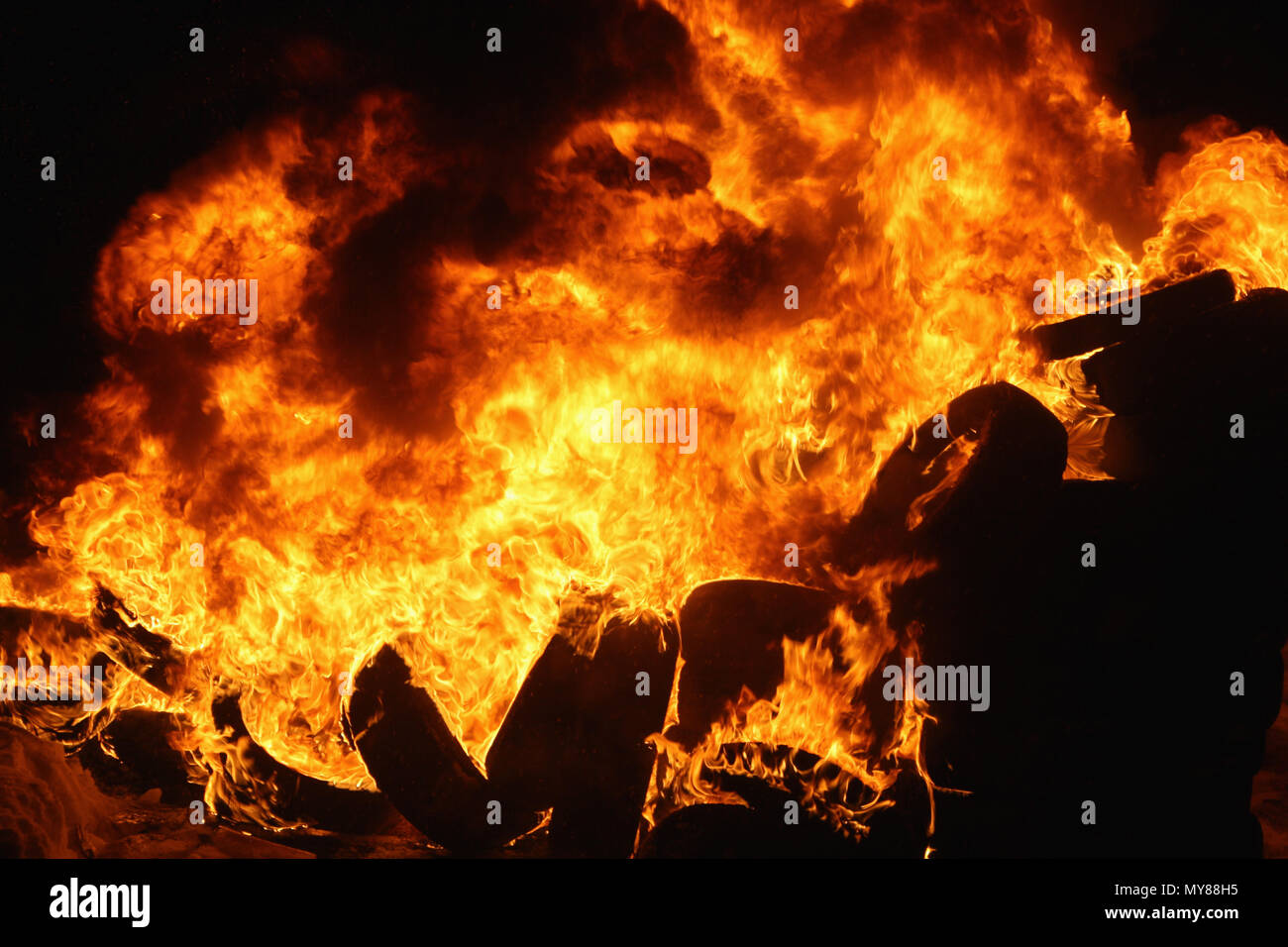 a huge bonfire flame texture background Stock Photo - Alamy