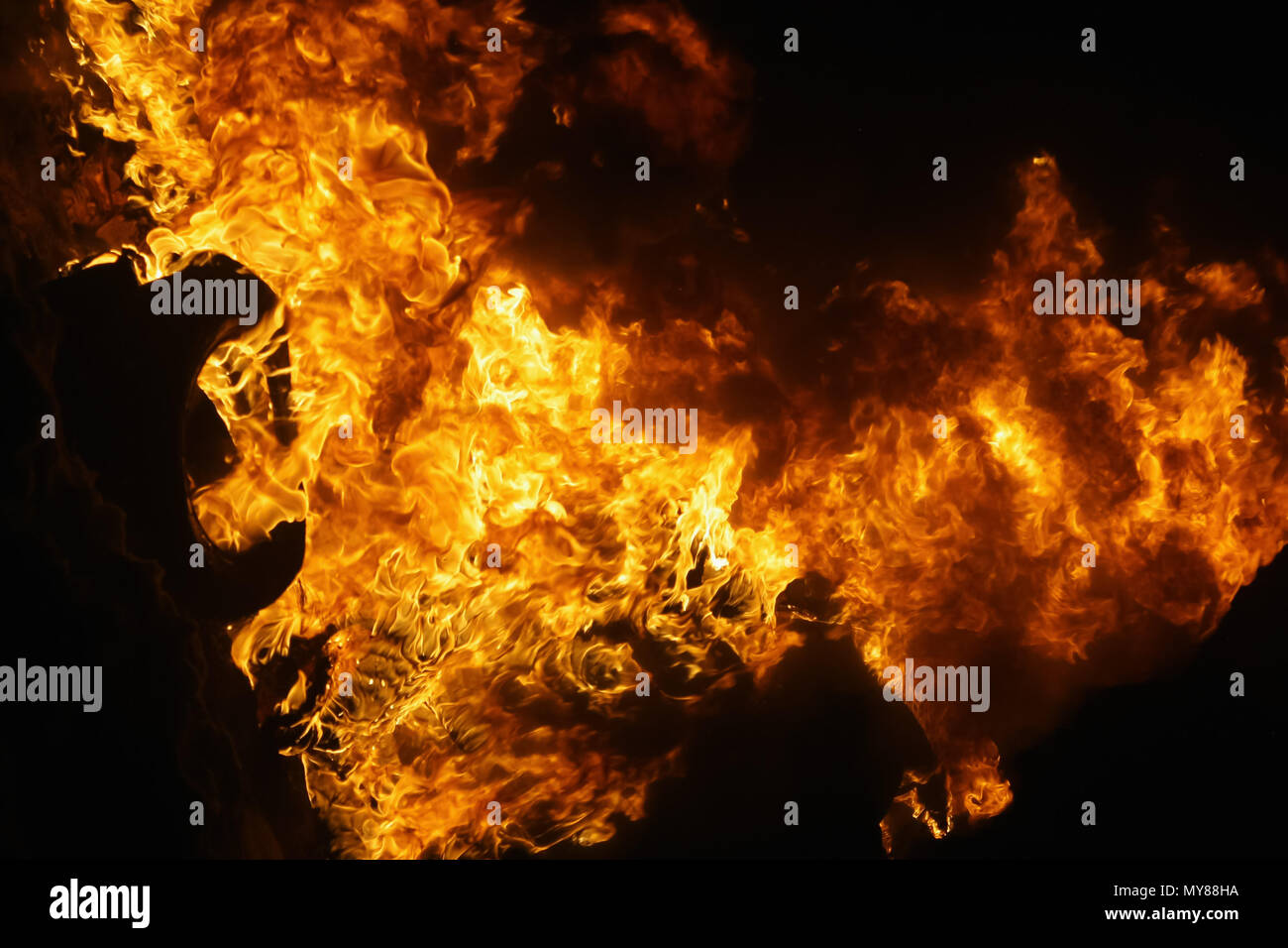 a huge bonfire flame texture background Stock Photo - Alamy