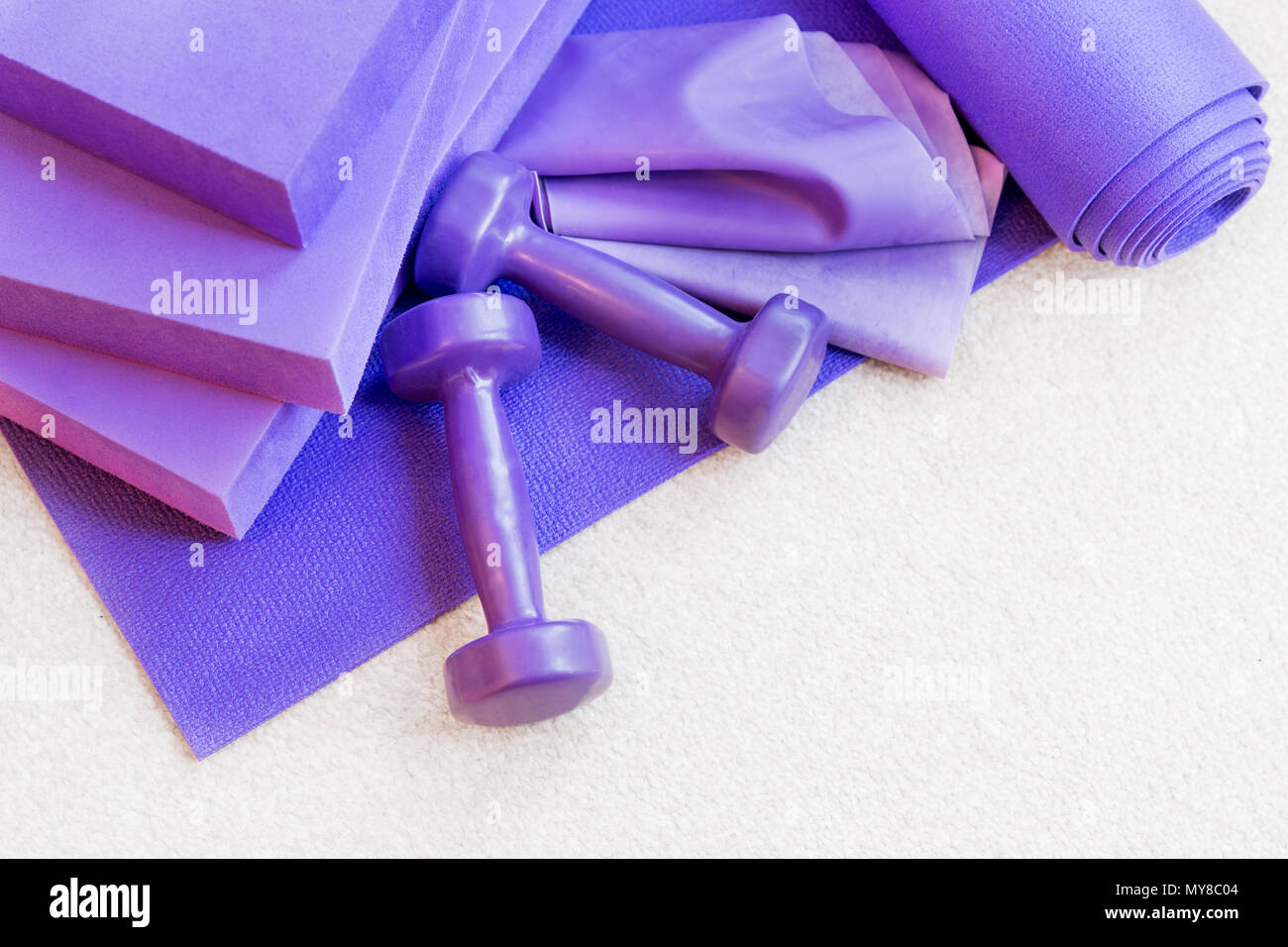 Fitness yoga pilates equipment props on carpet Stock Photo - Alamy