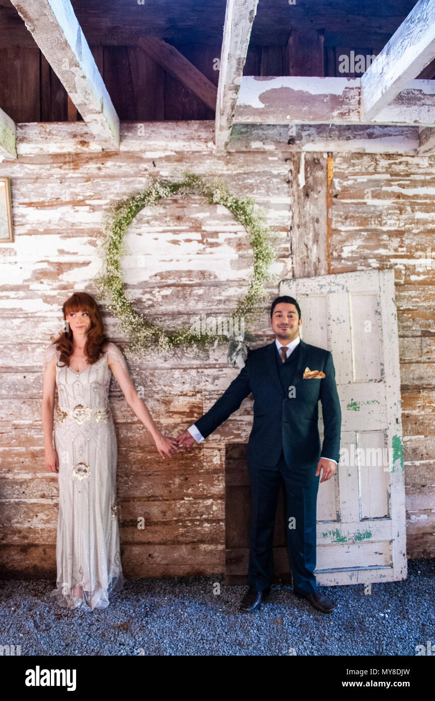 Millennial couple's barn wedding Stock Photo - Alamy