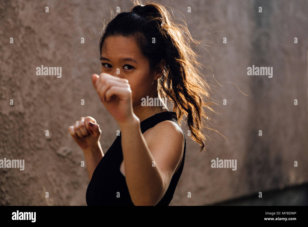 Woman in fighting stance hi-res stock photography and images - Alamy
