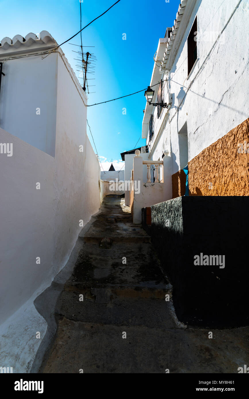 beautiful, picturesque street, narrow road, white facades of buildings ...