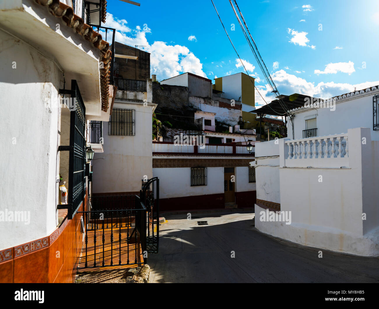 beautiful, picturesque street, narrow road, white facades of buildings ...