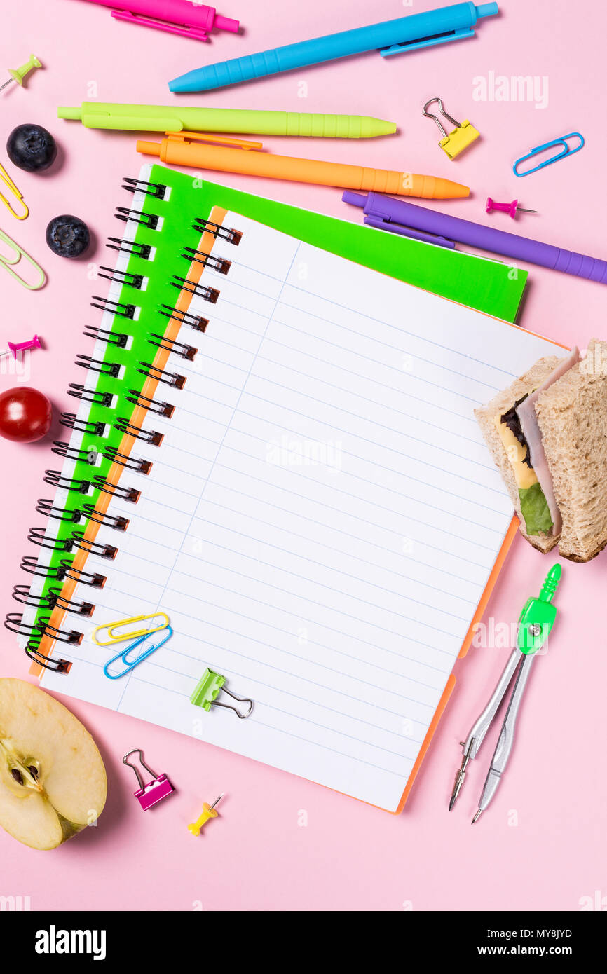 School background with notebooks and colorful supplies Stock Photo - Alamy