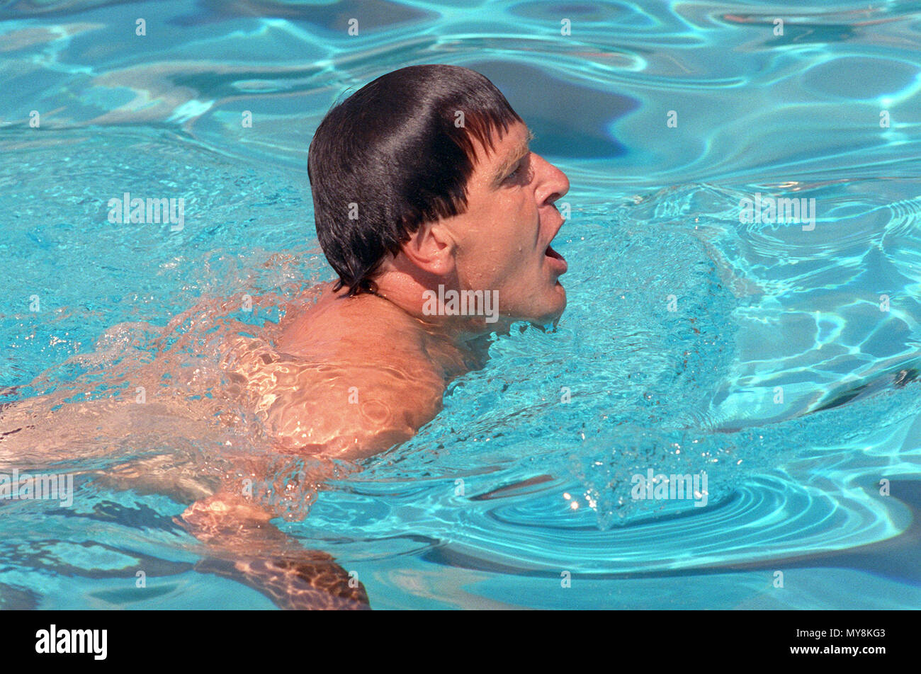 Premier of Lower Saxony, Gerhard Schroeder, swimming in an outdoor ...