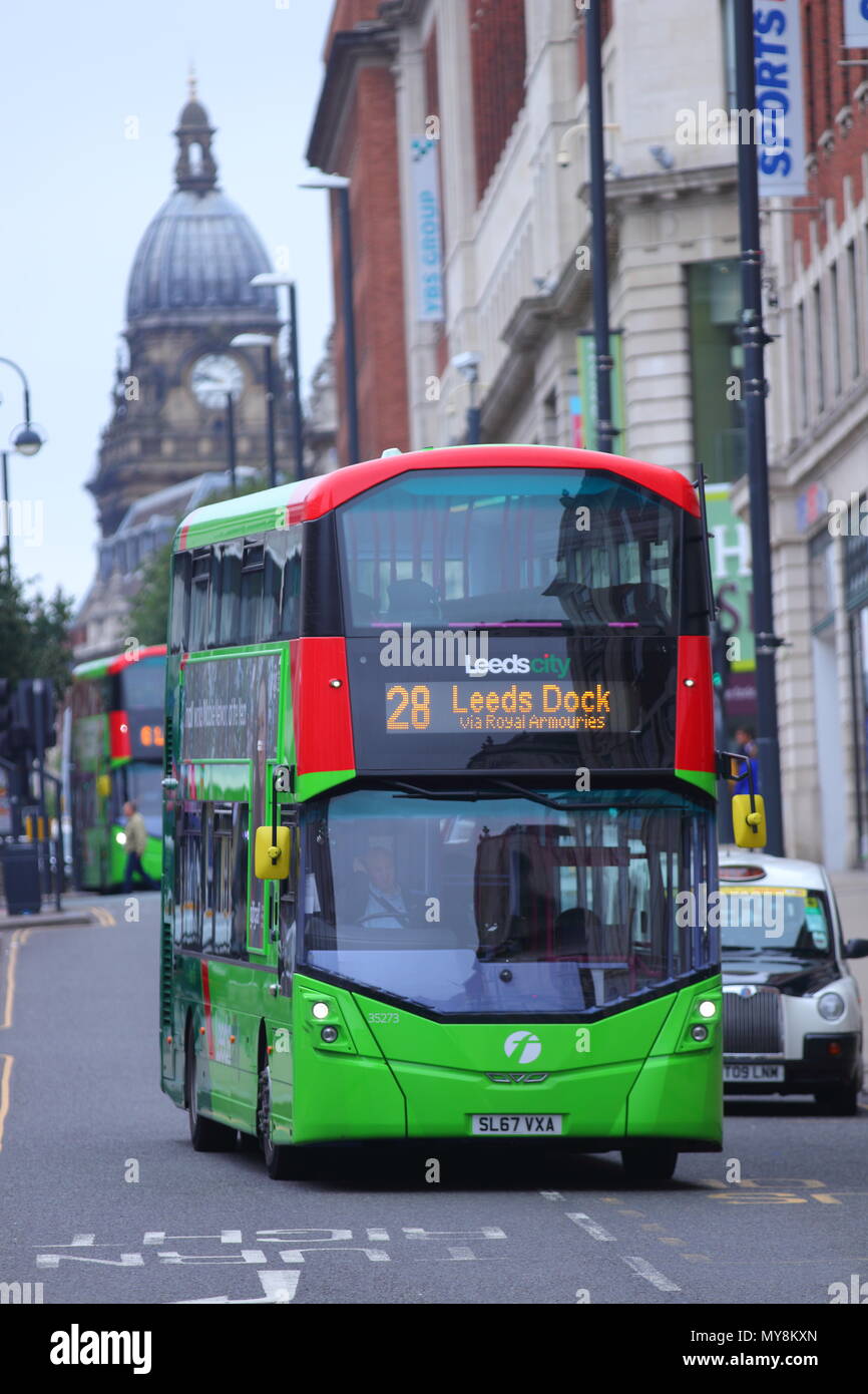Buses heading down the Headrow in Leeds City Centre Stock Photo - Alamy