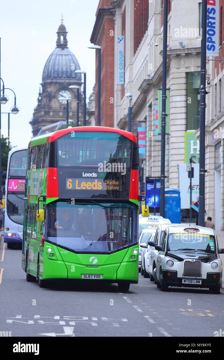 Buses heading down the Headrow in Leeds City Centre Stock Photo - Alamy