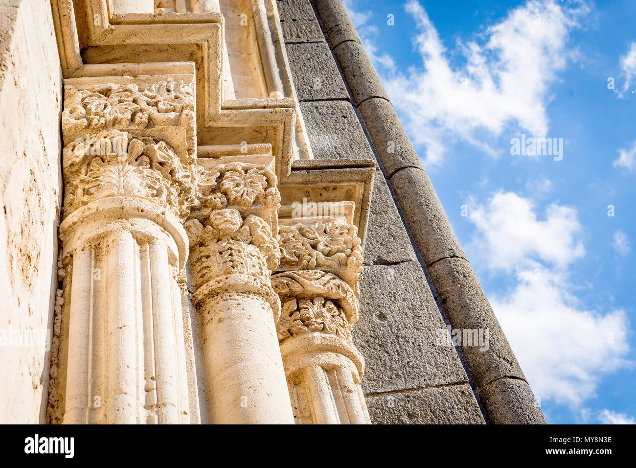 three ancient columns with capitals of the Corinthian order Stock Photo ...