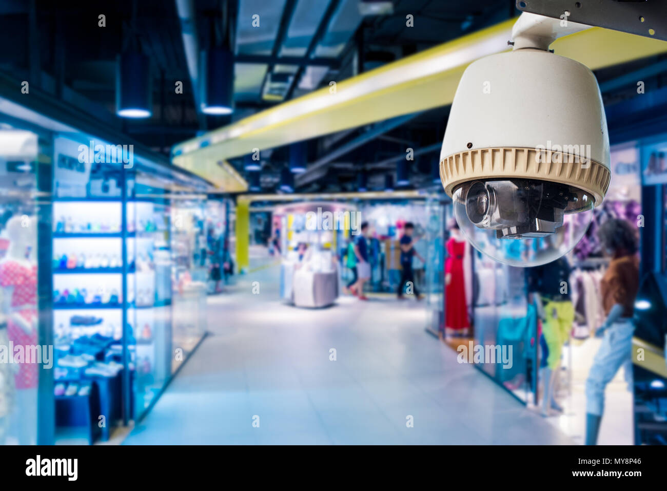 CCTV Camera Operating inside a station or department store Stock Photo ...