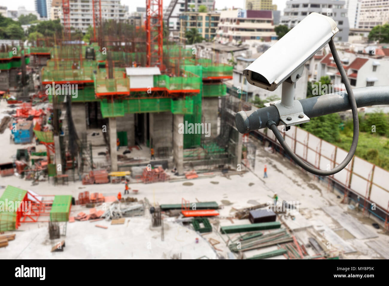 CCTV or surveillance operating over construction site Stock Photo - Alamy