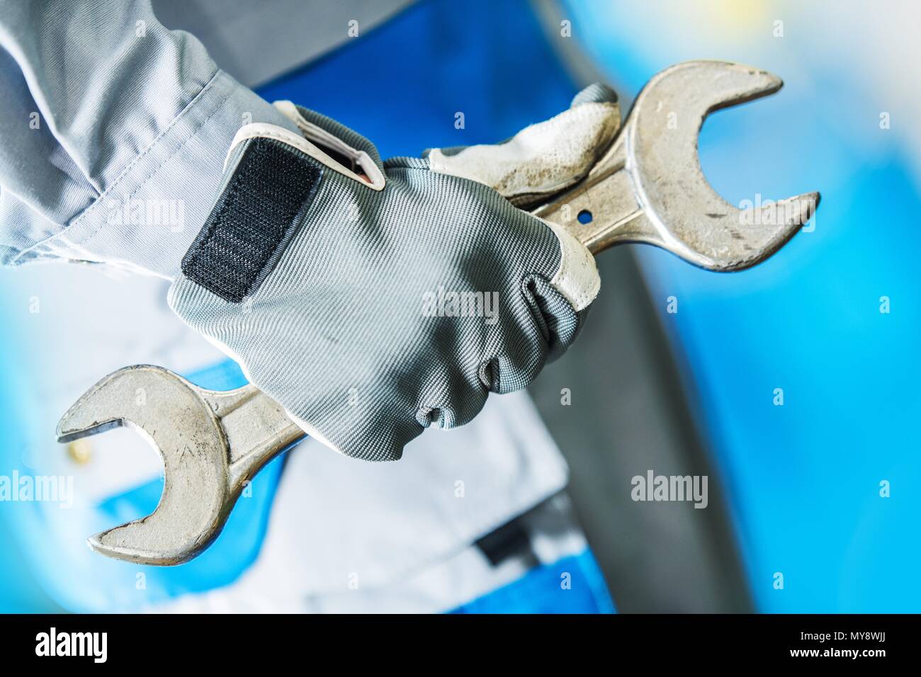 Heavy Duty Machinery Mechanic with Large Wrench. Industrial Theme. The ...