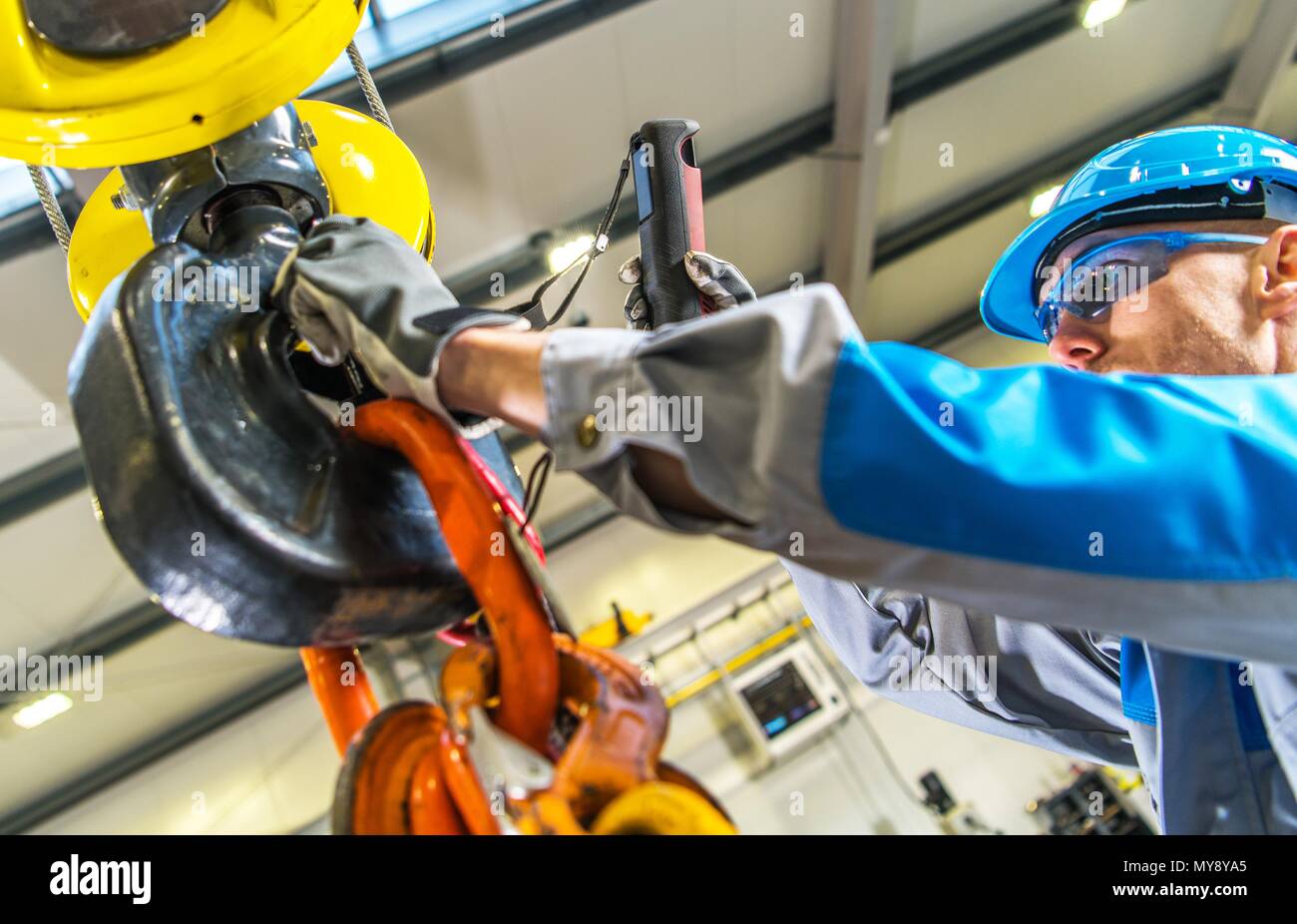 Warehouse Heavy Duty Crane Lift Operator Closeup Photo. Industrial ...