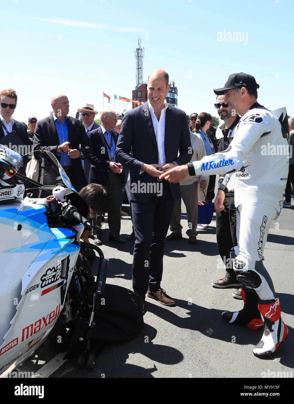 The Duke of Cambridge is shown a bike by motorcyclist Michael Rutter as ...