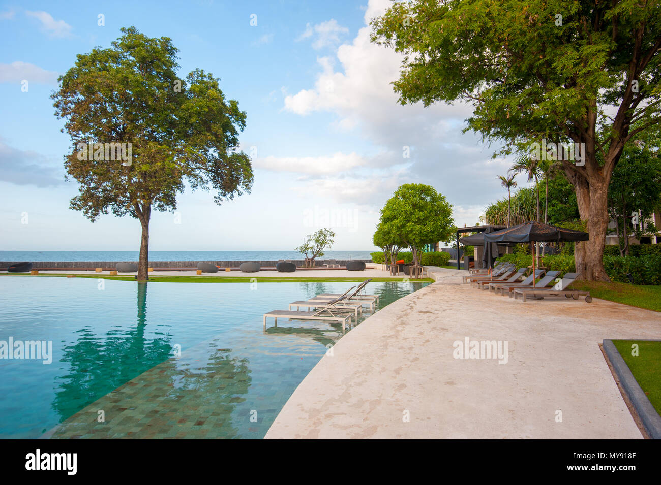 Garden tree sunset resort green tourist hi-res stock photography and ...