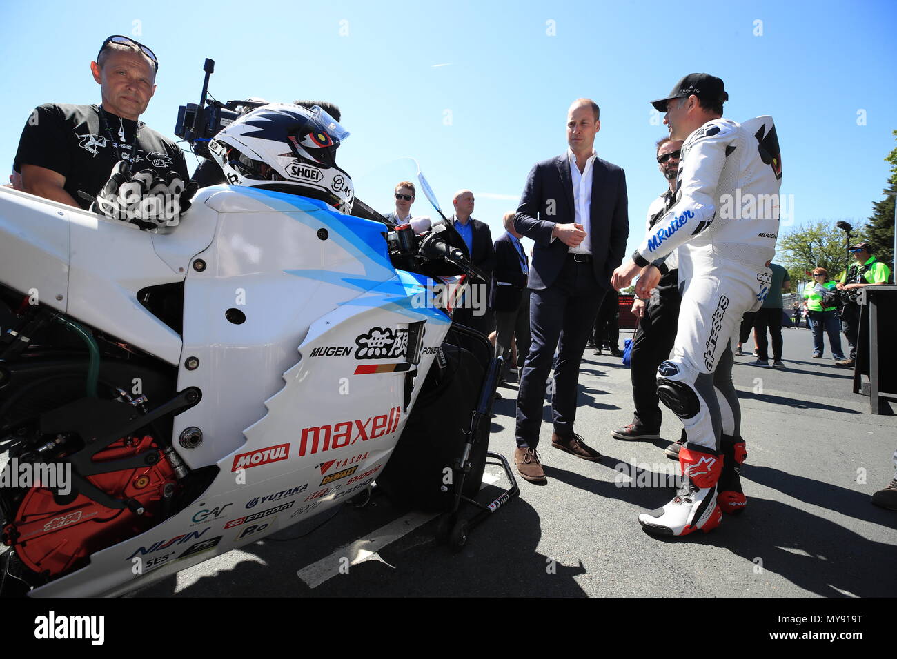 The Duke of Cambridge is shown a bike by motorcyclist Michael Rutter as ...