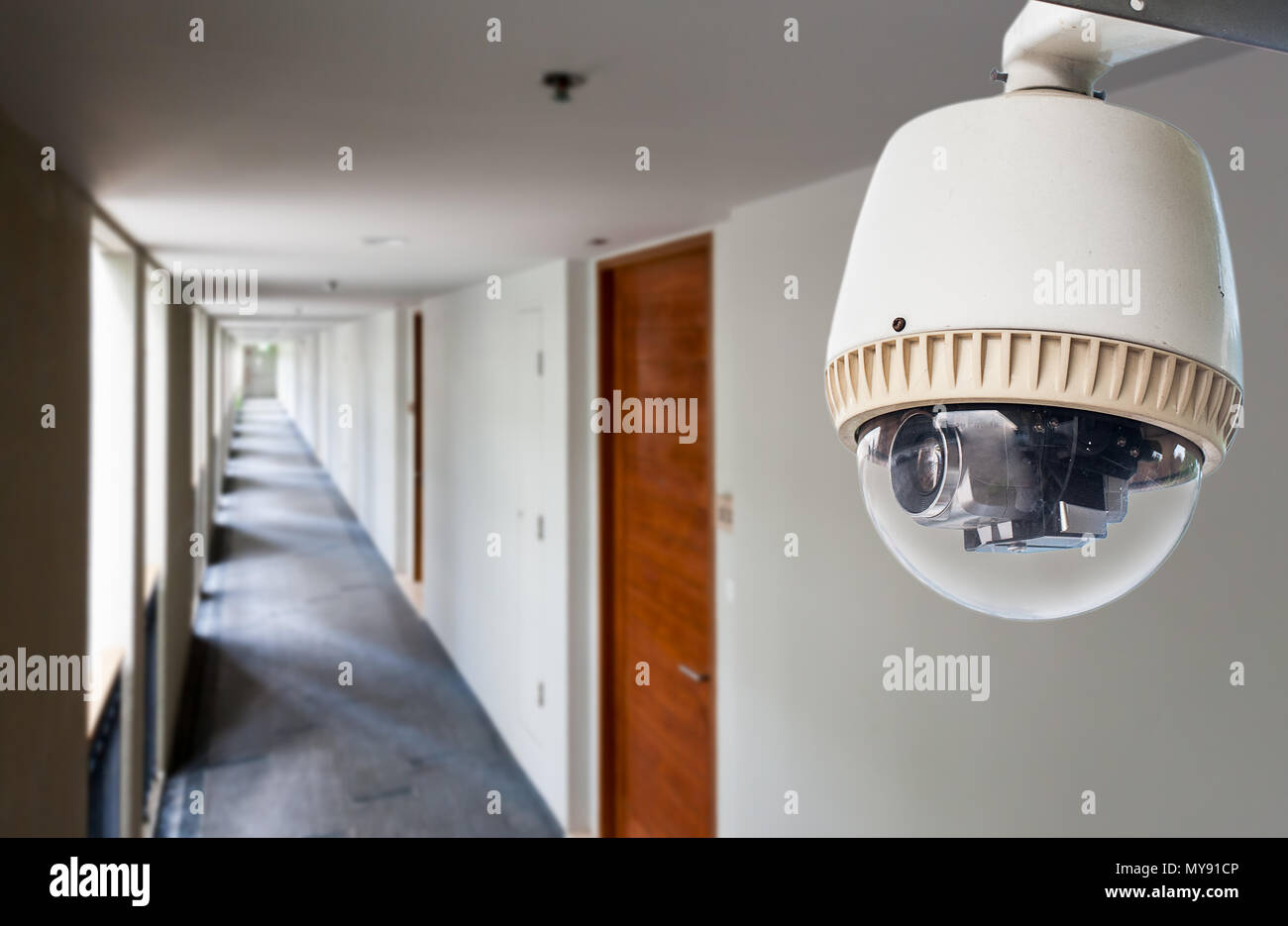 CCTV in condominium in front of rooms Stock Photo - Alamy