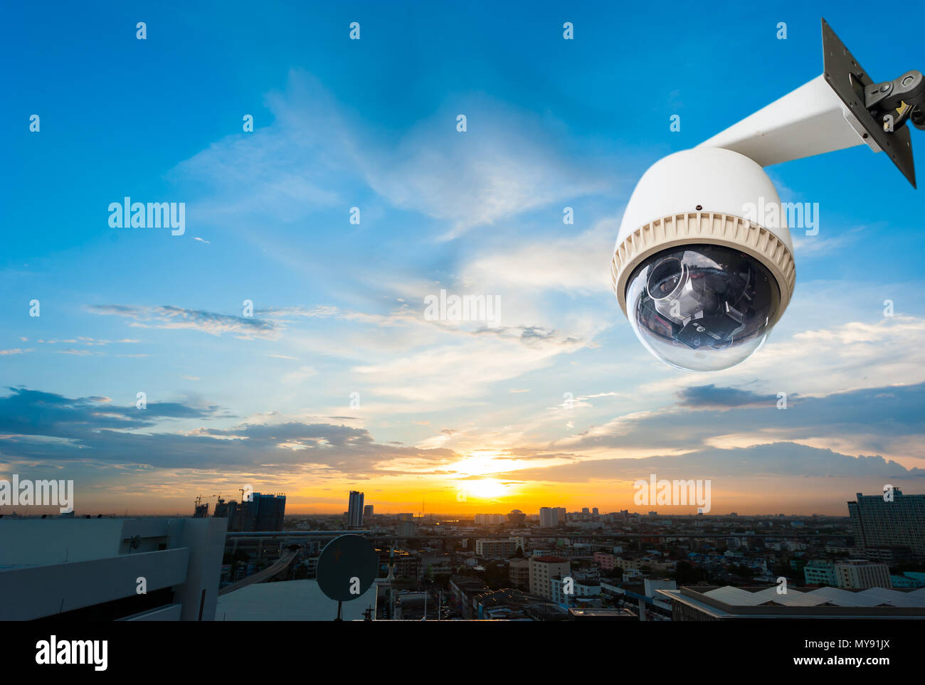 CCTV camera or surveillance with sunset sky background Stock Photo - Alamy