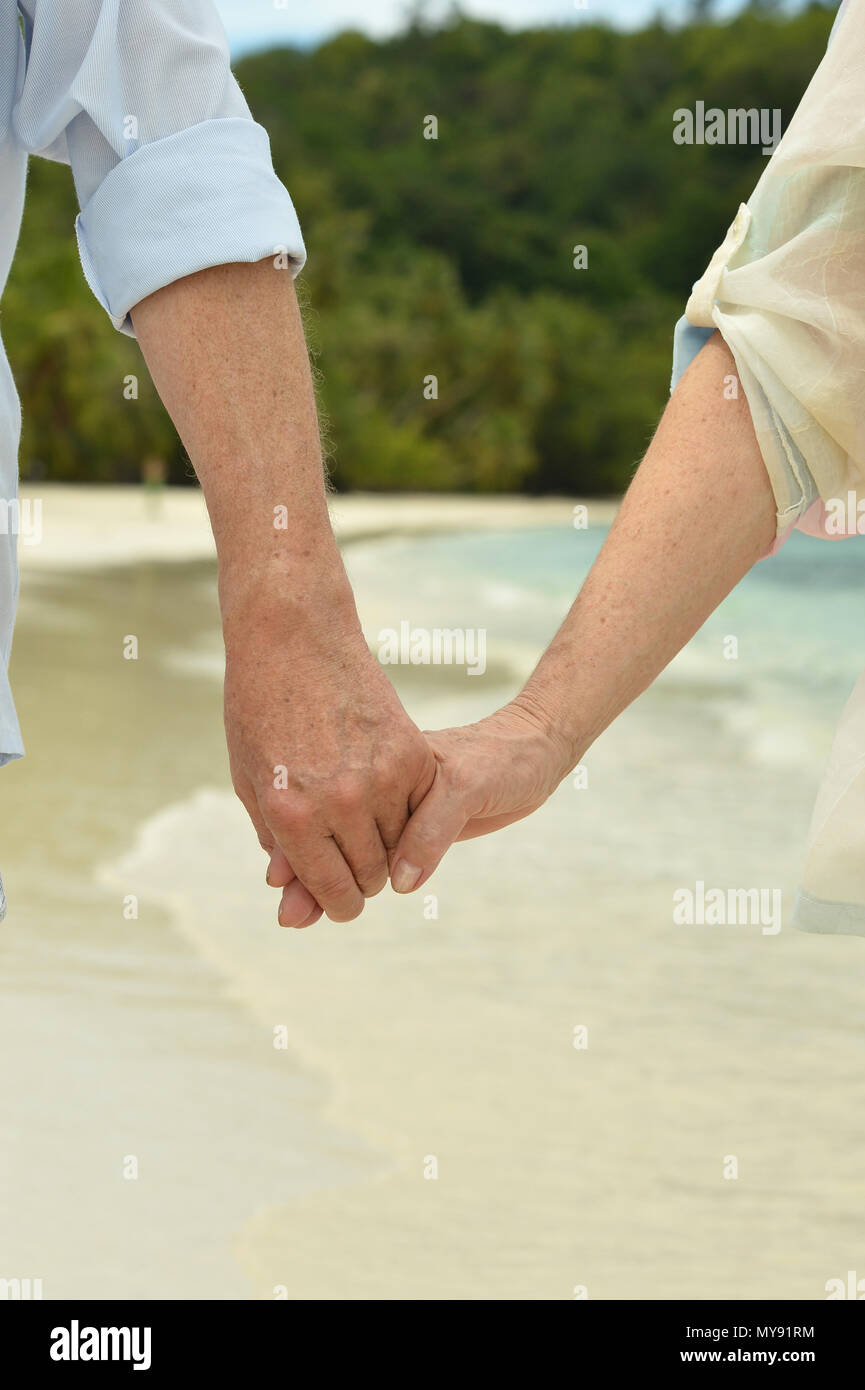 Elderly couple holding hands Stock Photo - Alamy Elderly couple holding hands Stock Photo - Alamy