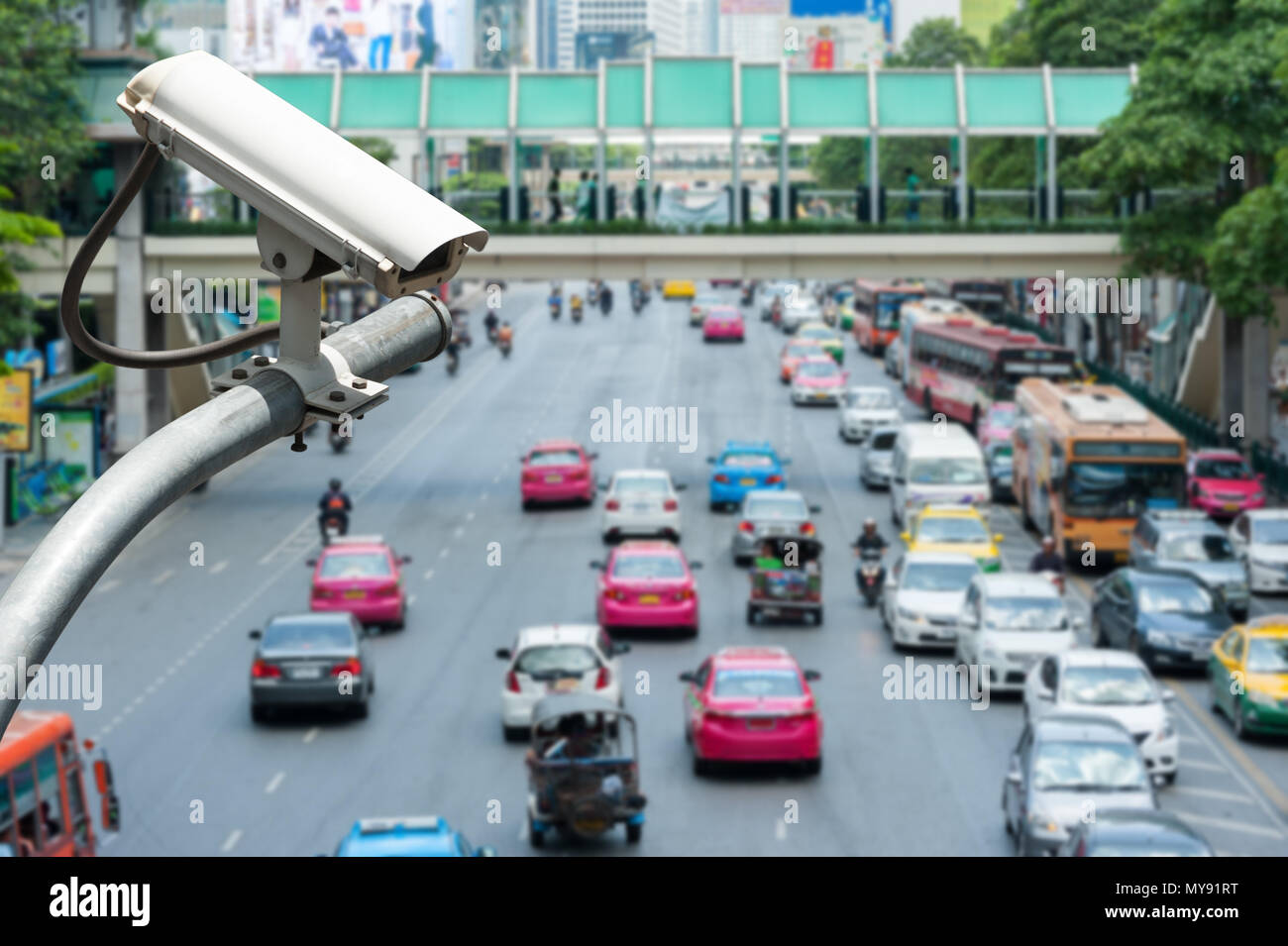 CCTV camera or surveillance operating on traffic road Stock Photo - Alamy