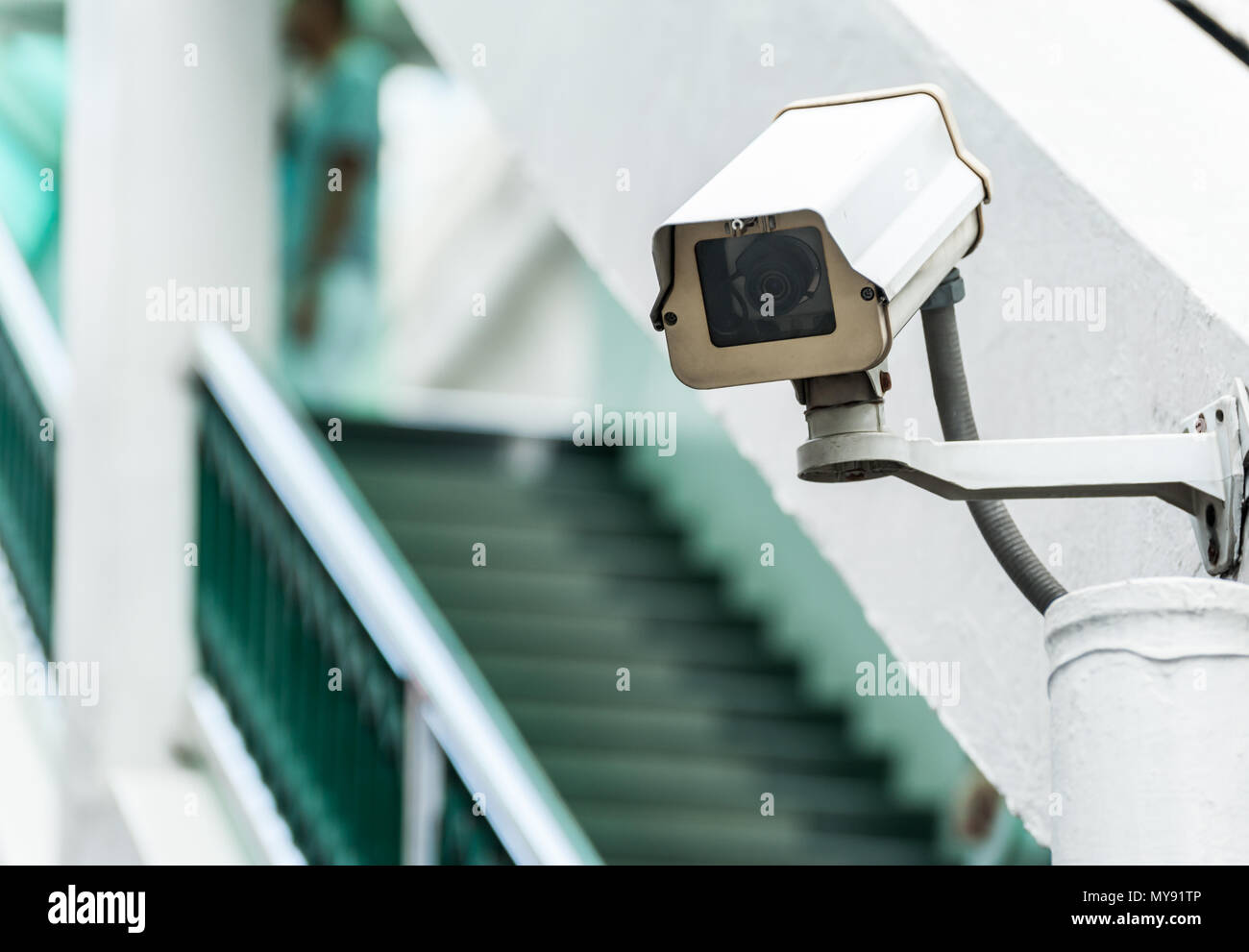 CCTV camera or surveillance operating above stair Stock Photo - Alamy