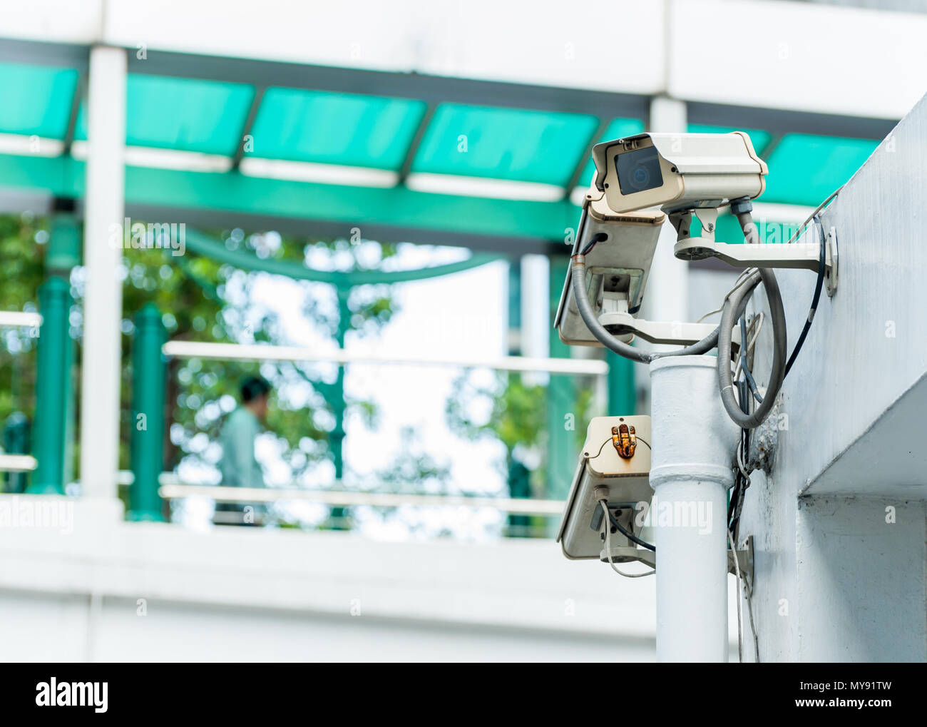 CCTV camera or surveillance operating above stair Stock Photo - Alamy