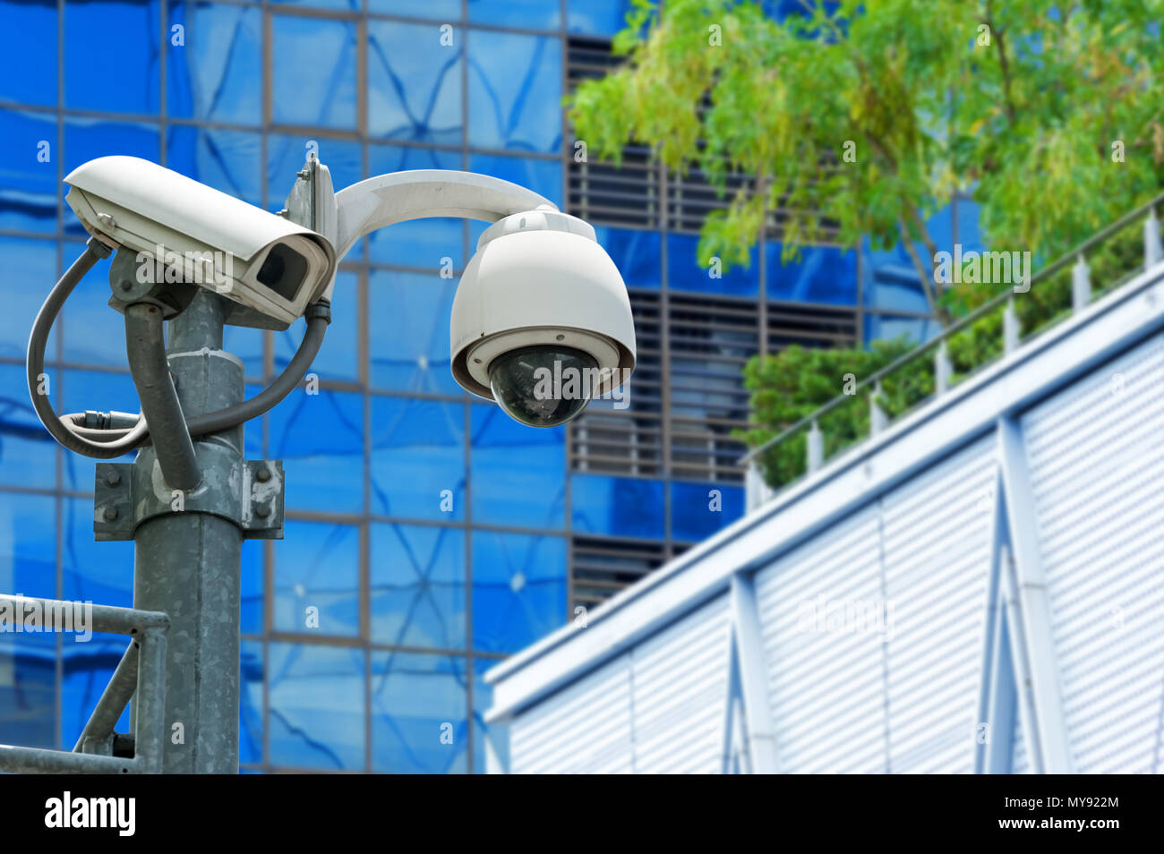 CCTV camera or surveillance operating on office corridor Stock Photo ...