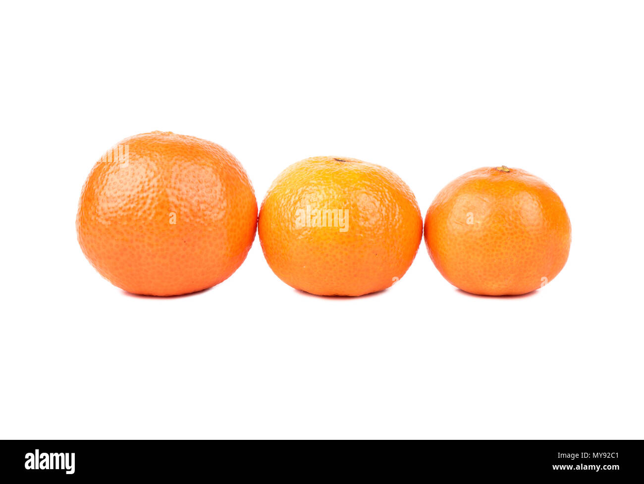 Three ripe fruit mandarin different sizes built in a row Stock Photo ...