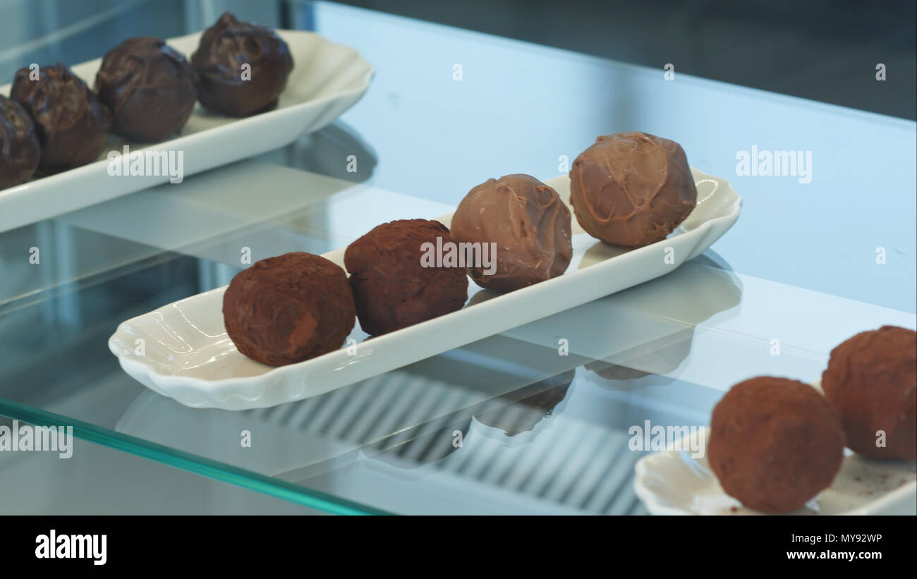 Sweet chocolate candy in a store window Stock Photo - Alamy