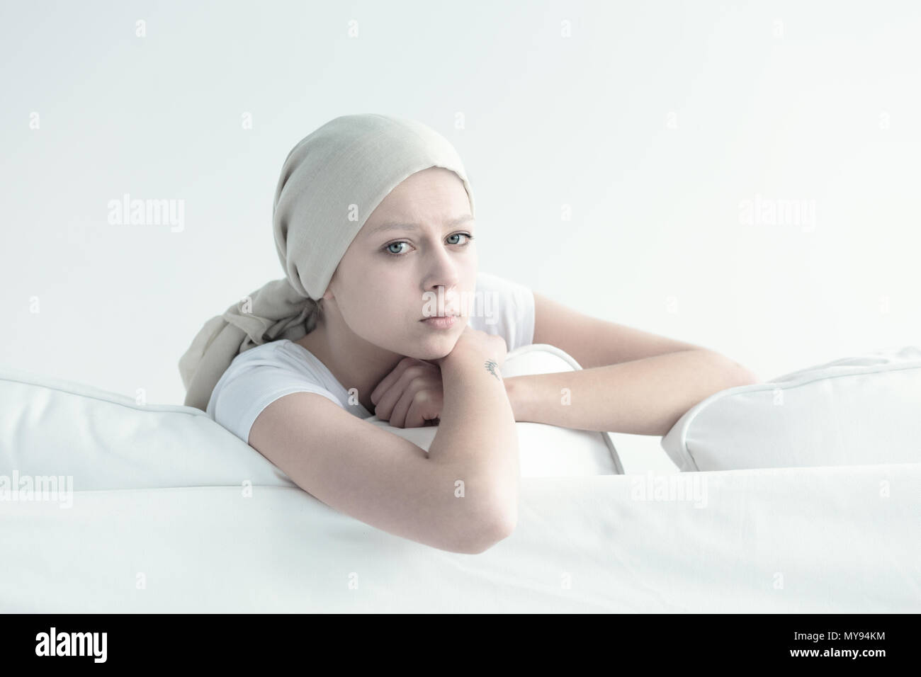 Sad look of woman suffering from cancer disease Stock Photo - Alamy