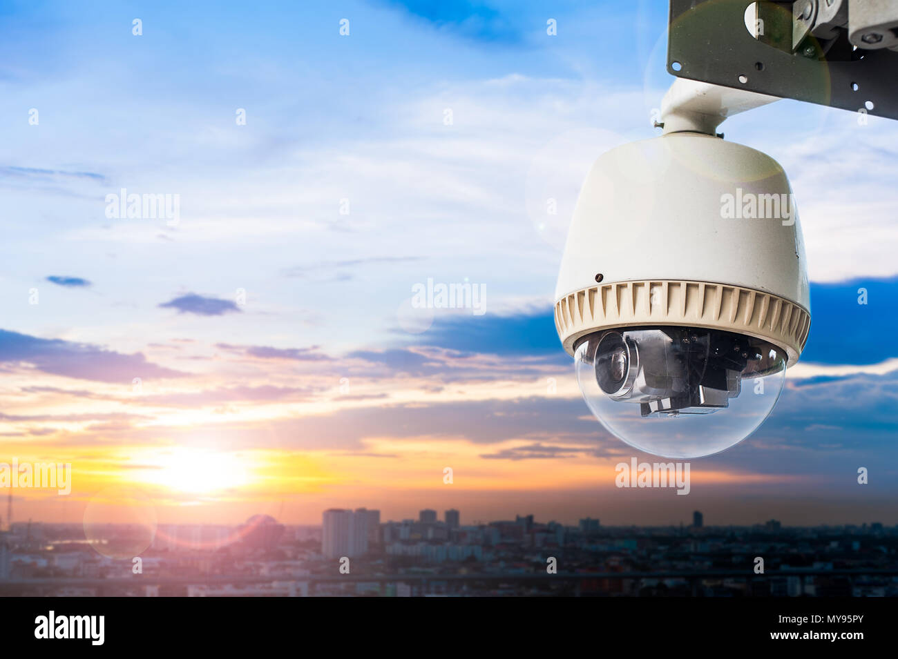 CCTV camera or surveillance with sunset sky background Stock Photo - Alamy