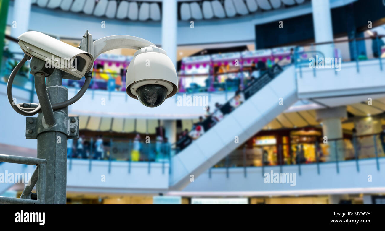 CCTV Camera Operating inside a station or department store Stock Photo ...