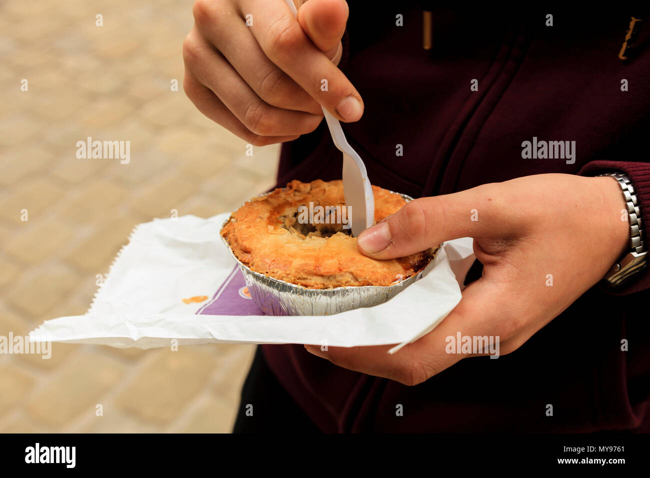 Eating a pie Stock Photo - Alamy