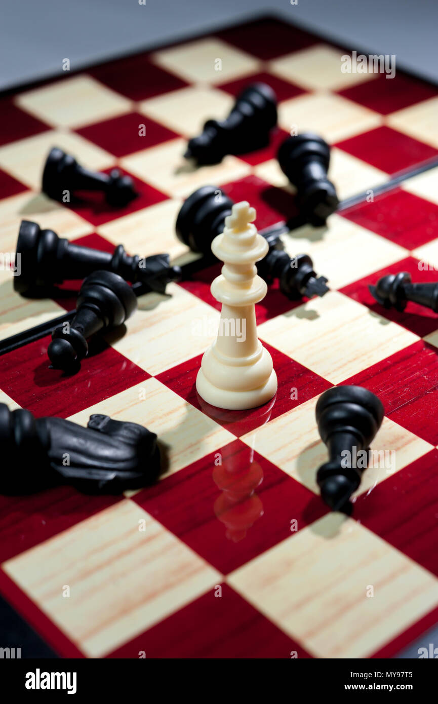 Chess board game showing the winner on white side business concept ...