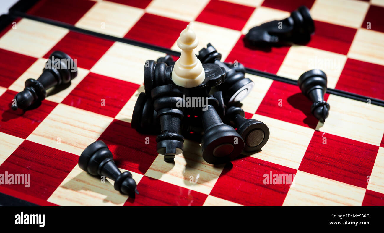 Chess board game showing the winner on white side business concept ...