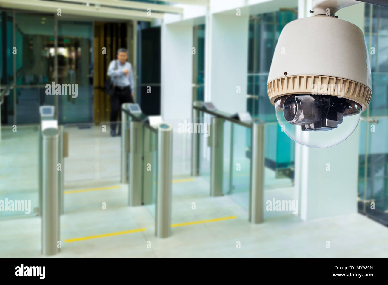 CCTV camera or surveillance operating in building entrance Stock Photo ...