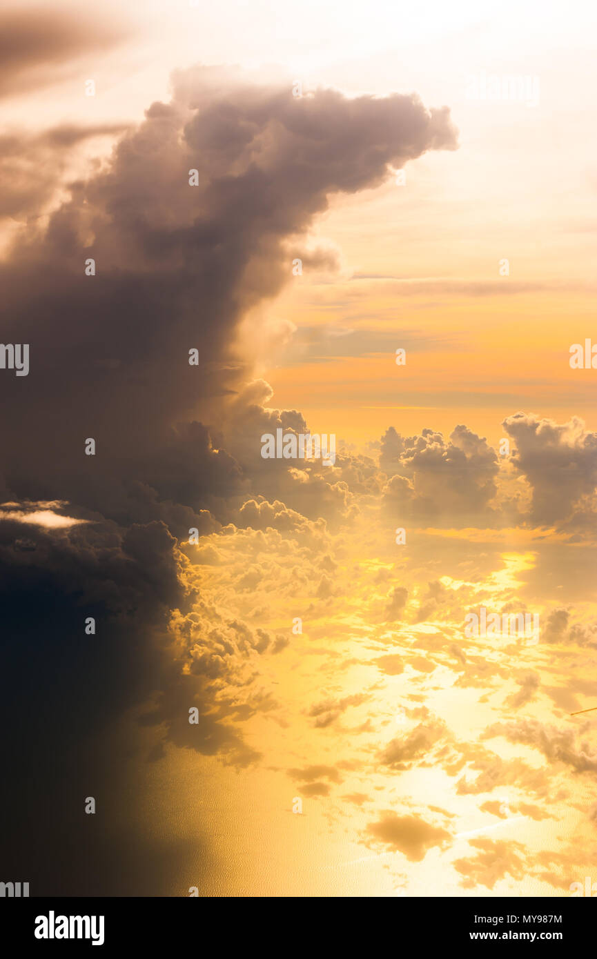 Sunset / sunrise with clouds, light rays and other atmospheric effect ...