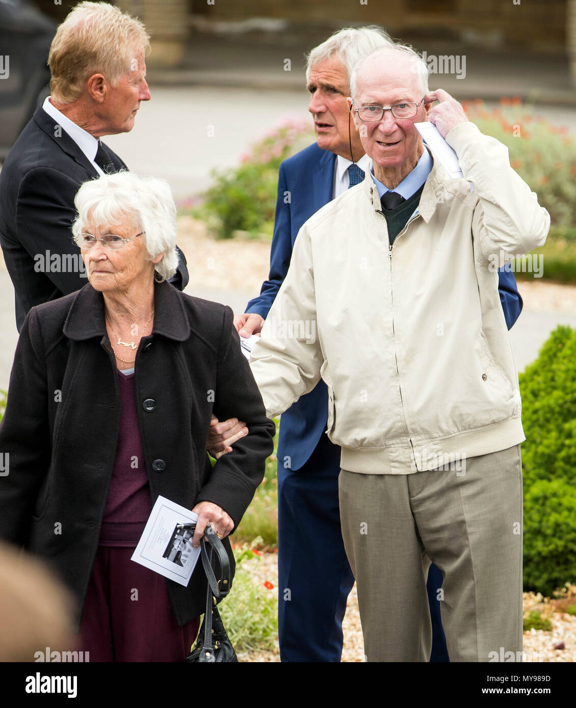 Jack Charlton (right) leaves the funeral of 1966 World Cup winner Ray ...