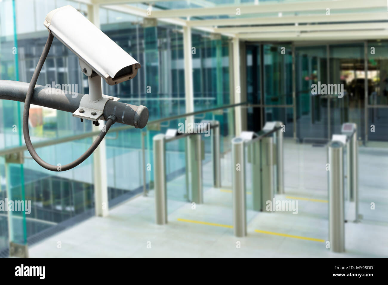 CCTV camera or surveillance operating in building entrance Stock Photo ...