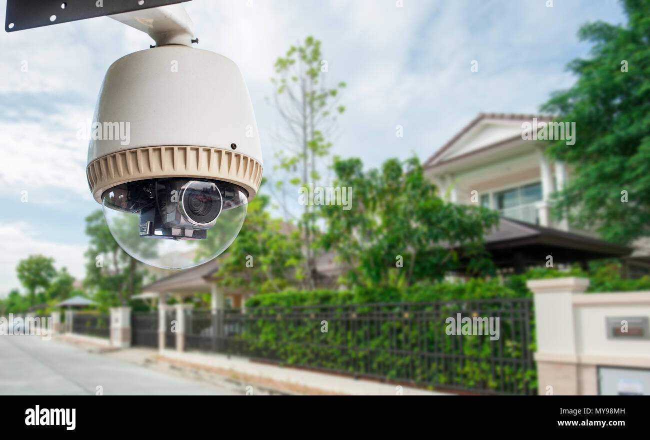 CCTV Camera with house in background Stock Photo - Alamy